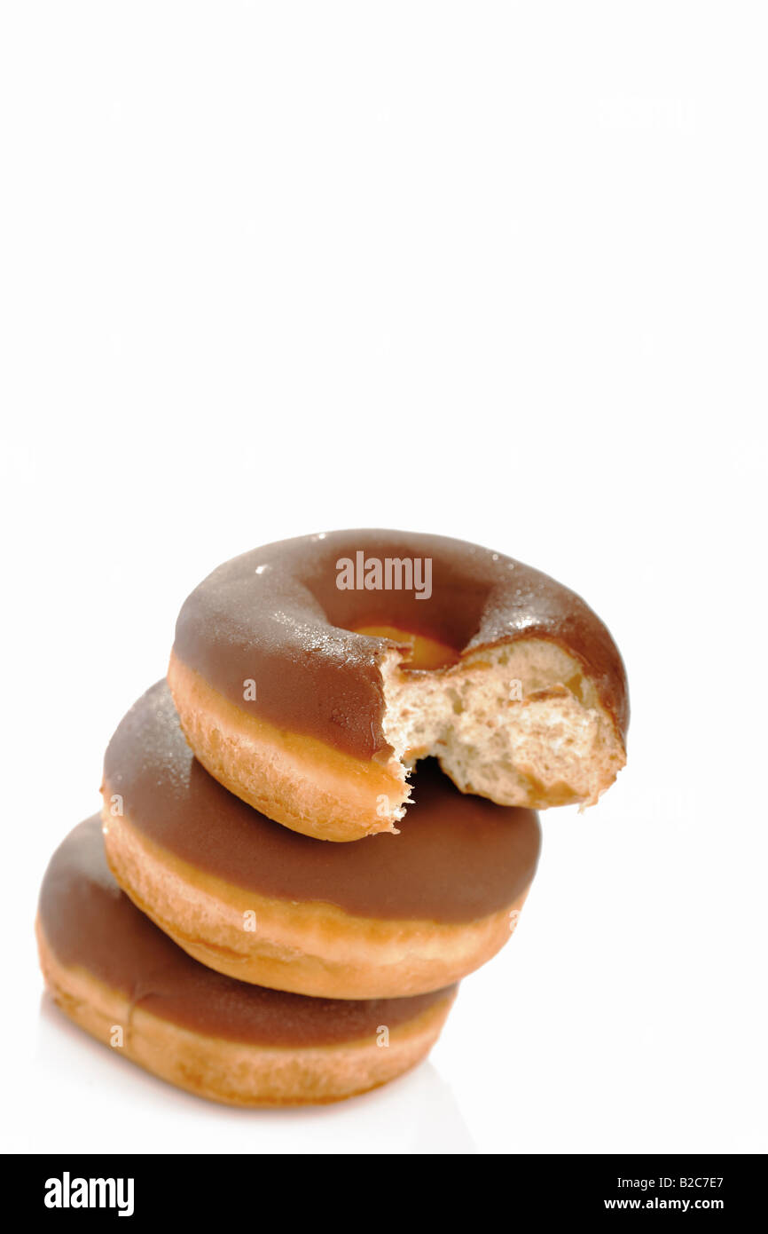 Donuts with milk chocolate coating Stock Photo - Alamy