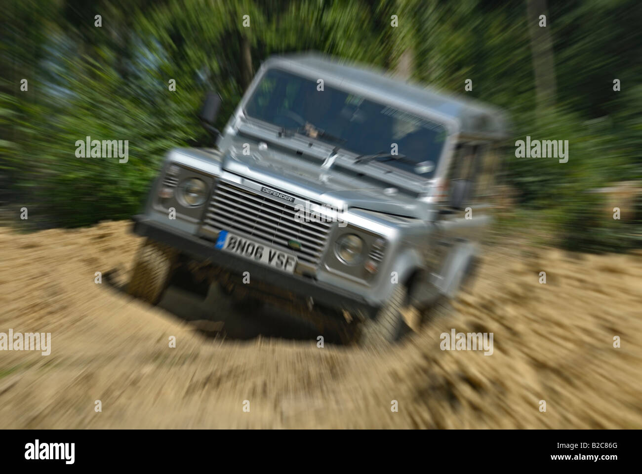 Off roading silver metallic Land Rover Defender 110 TD5 by Land Rover ...