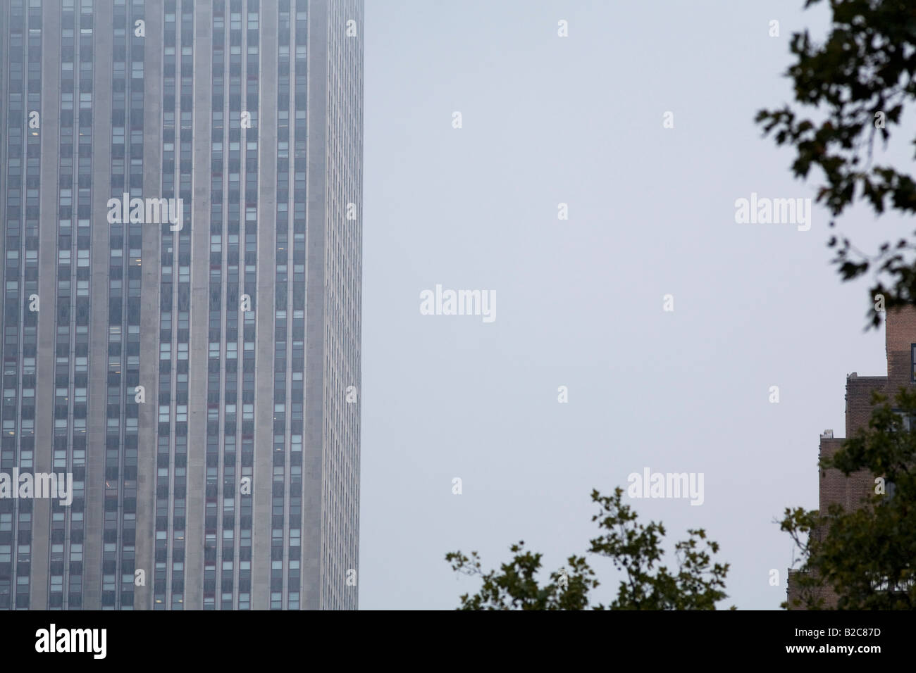 Empire State Building in fog, NYC Stock Photo - Alamy