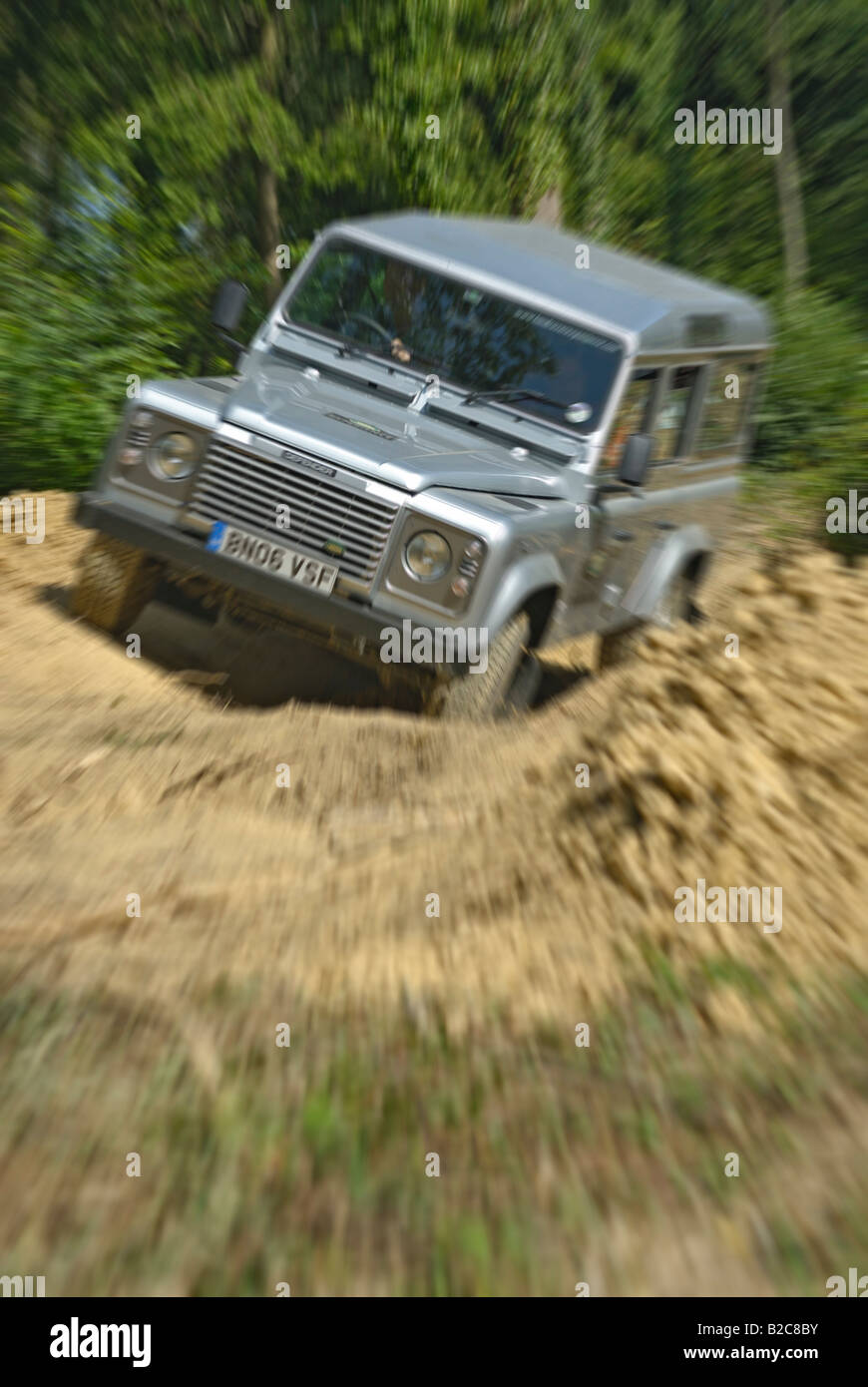 Off roading silver metallic Land Rover Defender 110 TD5 by Land Rover ...