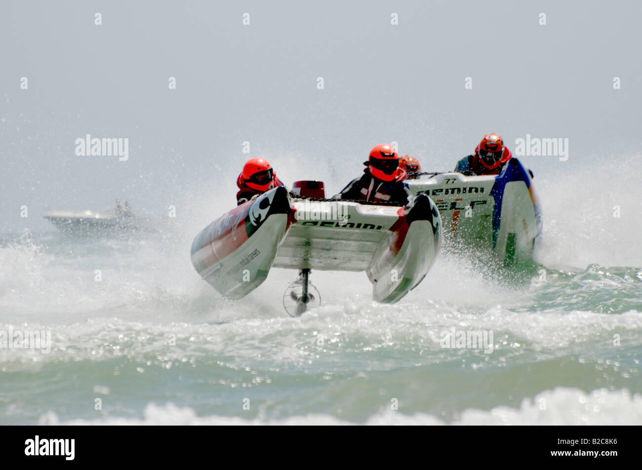 Two `Zap Cat` powerboats race at speed against each other during a ...