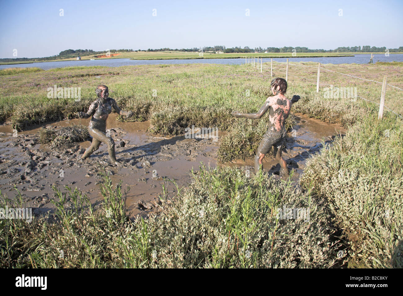 Children playing in mud pool Stock Photo - Alamy
