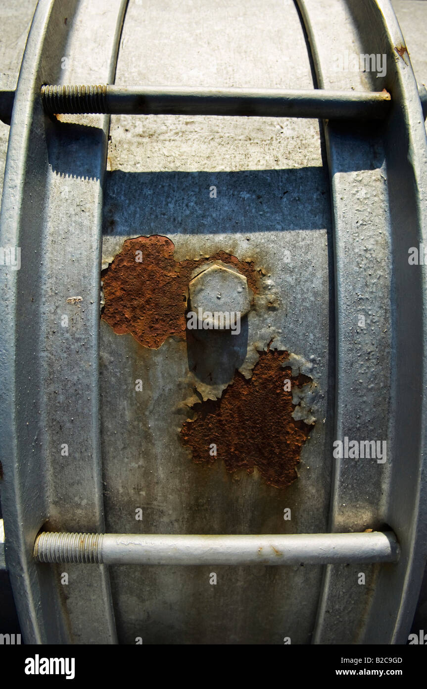 A rusty pipework joint painted in gray Stock Photo - Alamy