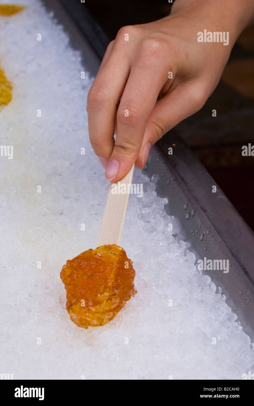 Maple taffy on snow hi-res stock photography and images - Alamy