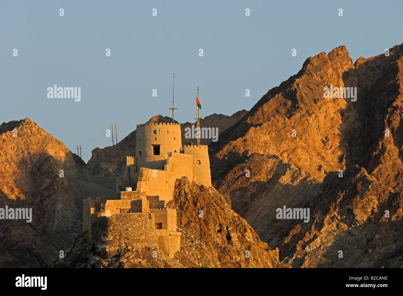 Historic Mutrah Fort in hills the old town of Muscat Oman Stock Photo ...