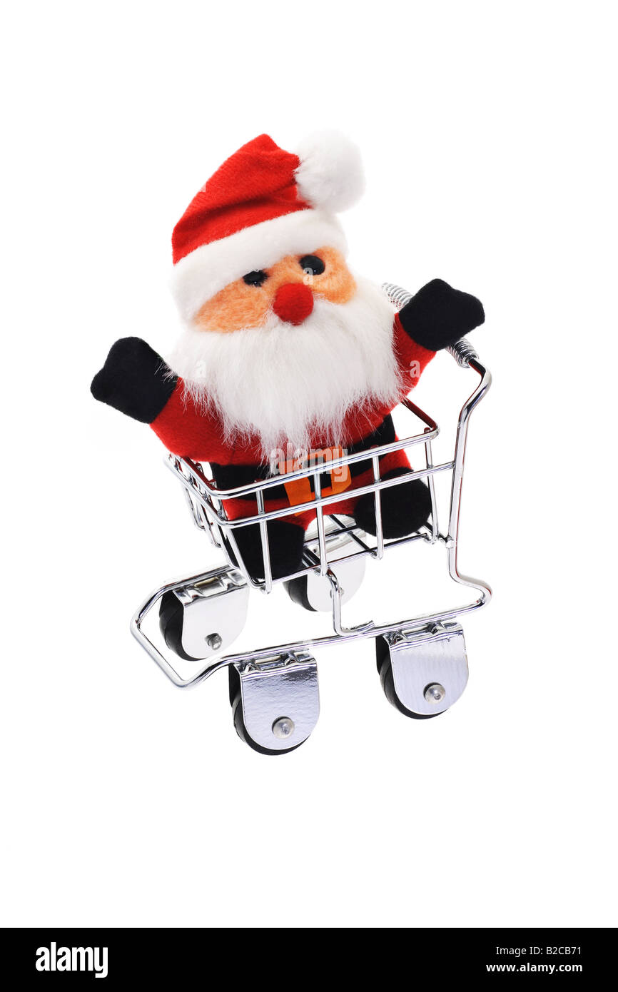 Santa Claus in mini shopping cart on white background Stock Photo - Alamy