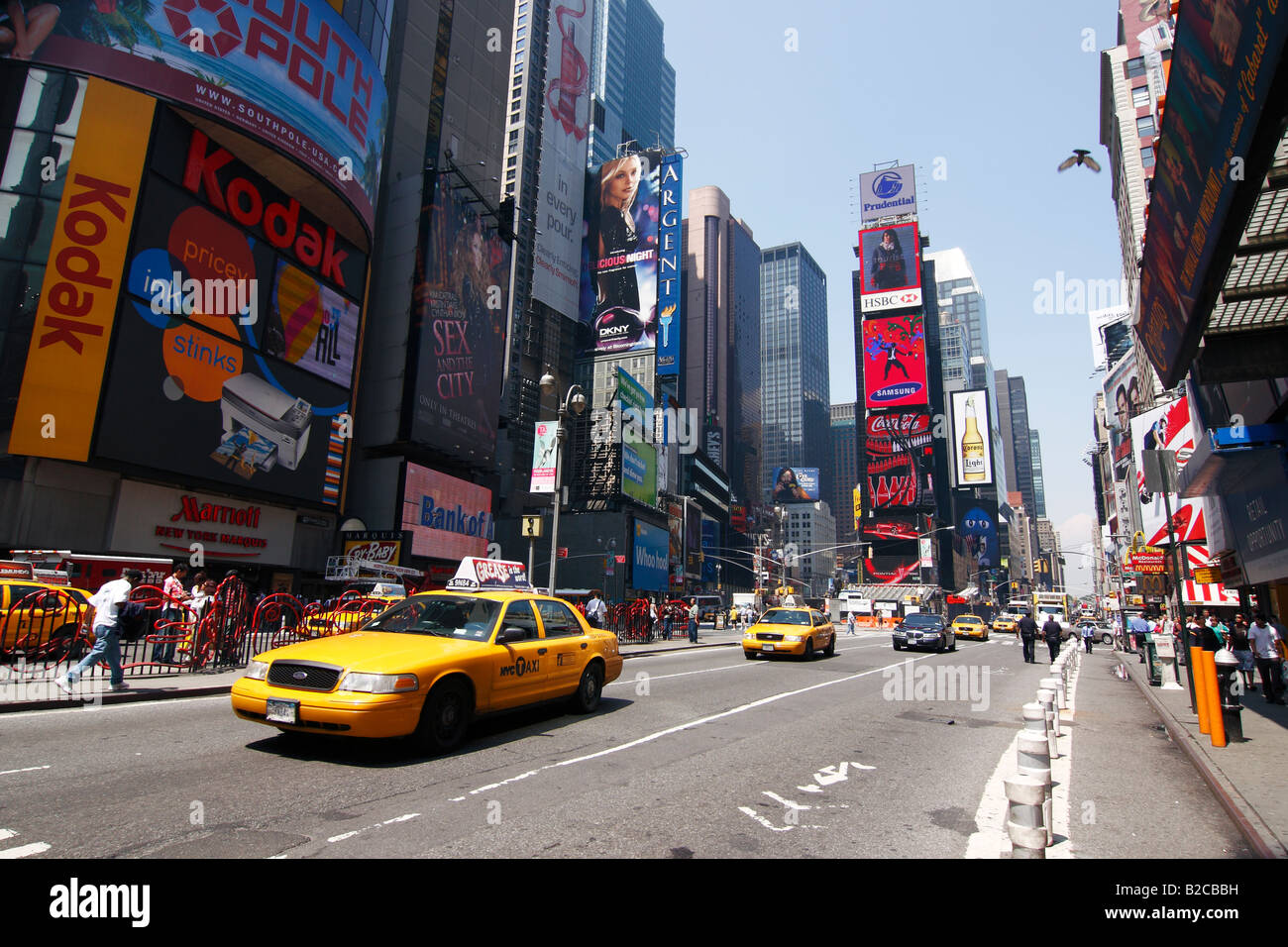 Yellow taxi in Times Square - New York City, USA Stock Photo - Alamy