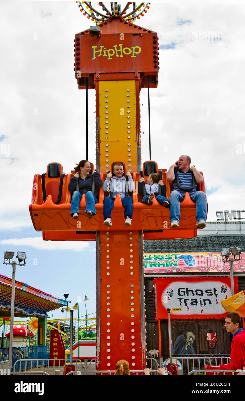 Children enjoying a funfair ride hi-res stock photography and images ...