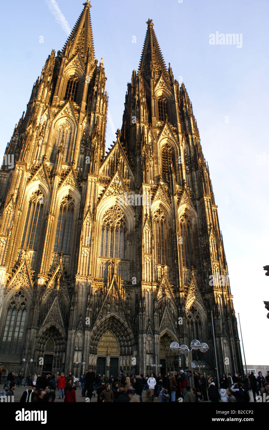 Cologne Cathedral facade with tourists in front Stock Photo - Alamy
