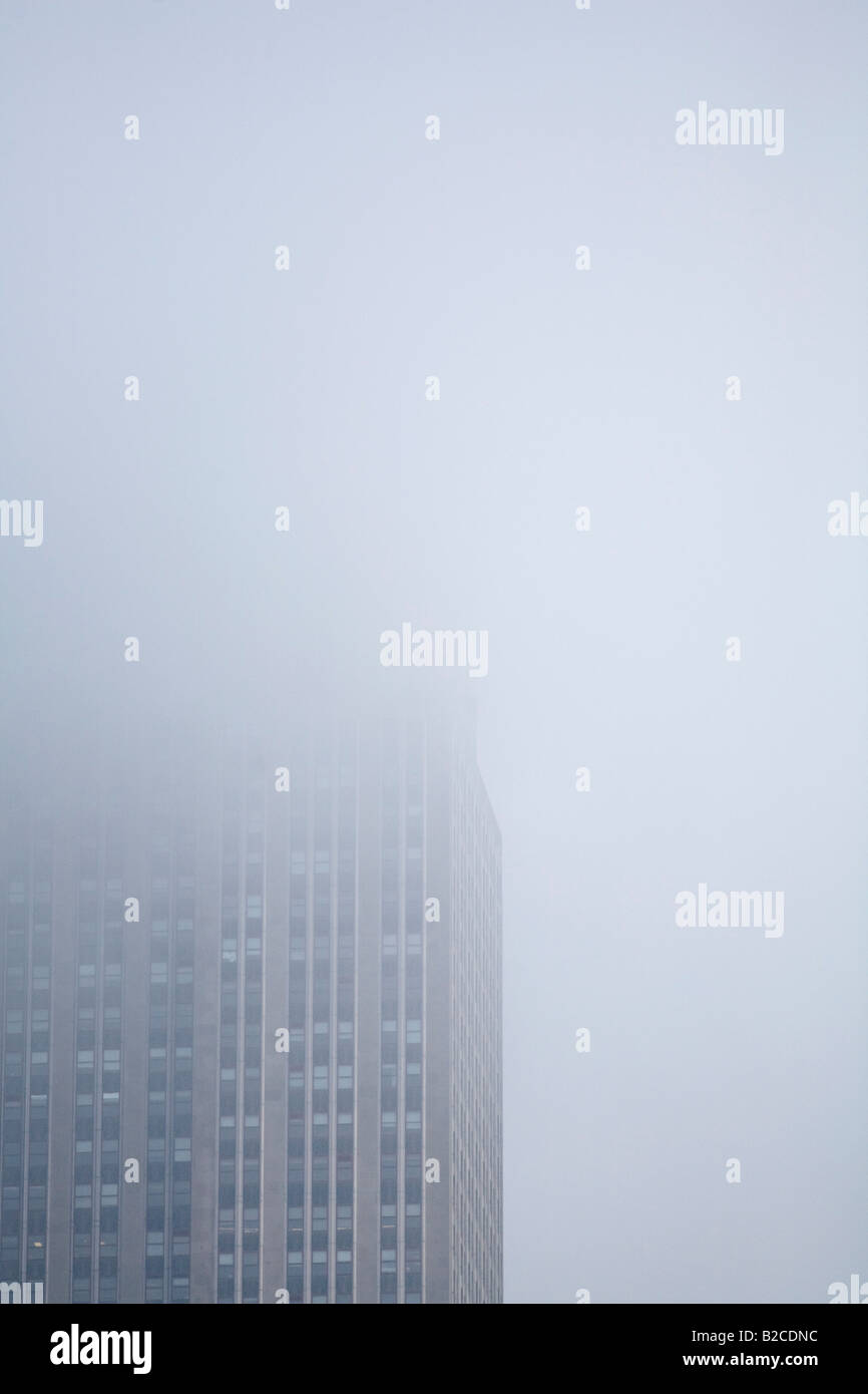 Empire State Building in fog, NYC Stock Photo - Alamy