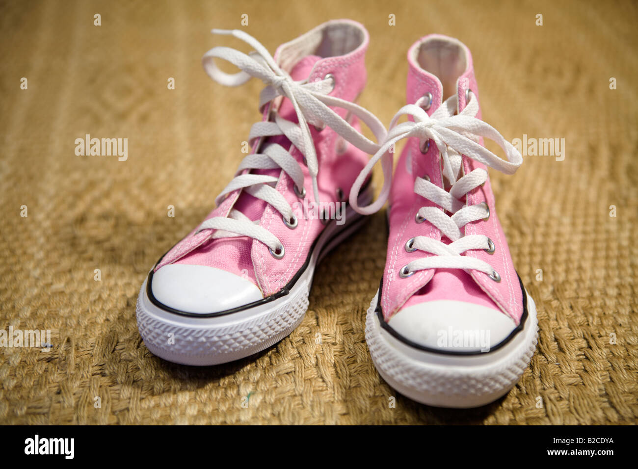 a pair of child's converse Stock Photo - Alamy