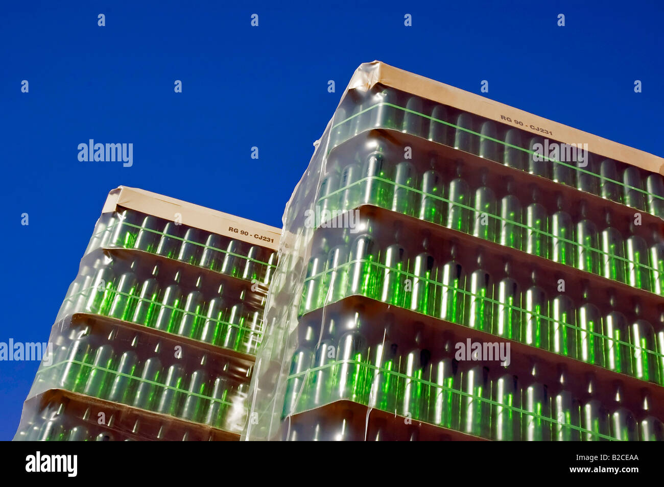 Huge stack of green glass bottles in a winery Stock Photo - Alamy