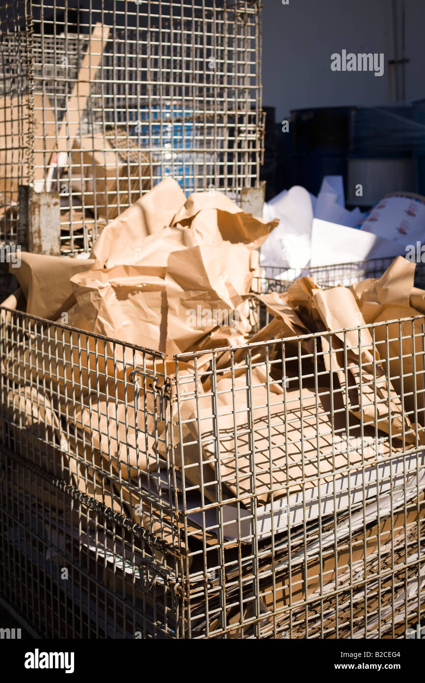 recycling containers filled with paper and cardboard Stock Photo - Alamy