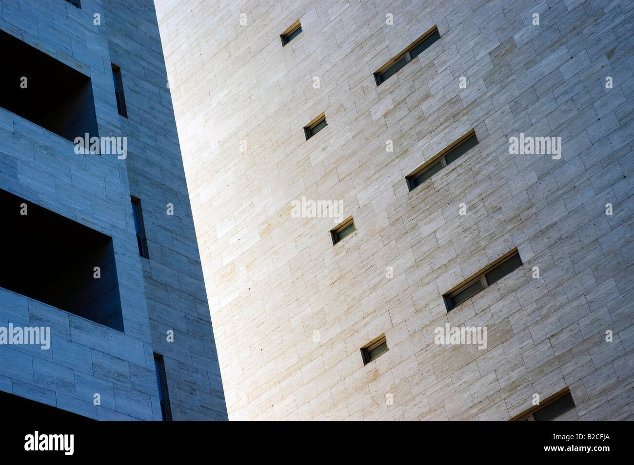 Apartment block with stone cladding Stock Photo - Alamy