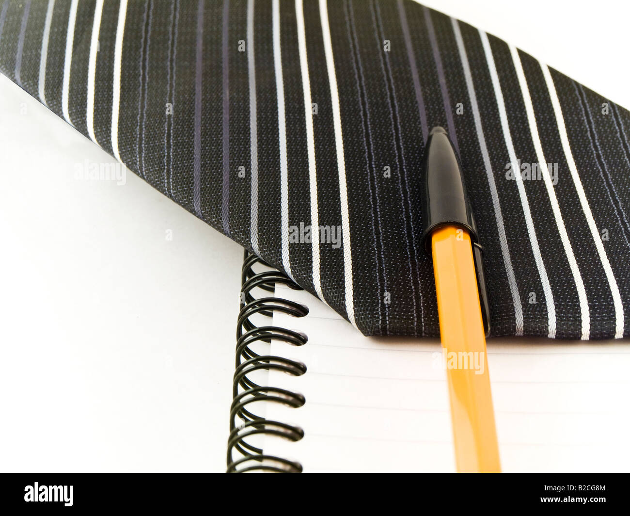 Ballpoint Pen and Tie on Notebook White Background Stock Photo - Alamy