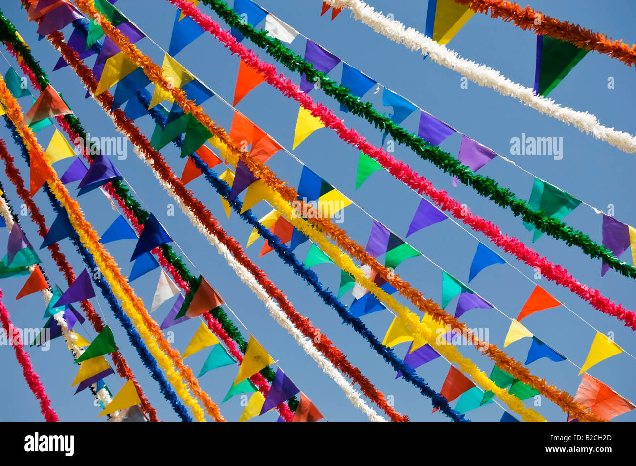 Rows of multicolored festive flags Stock Photo - Alamy