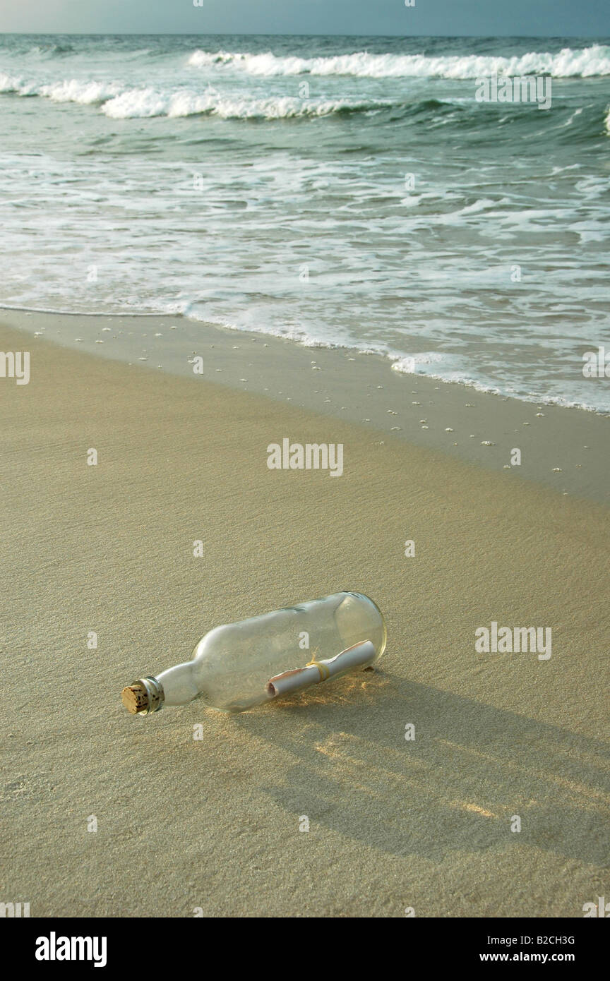 Message in a bottle on a shore Stock Photo - Alamy