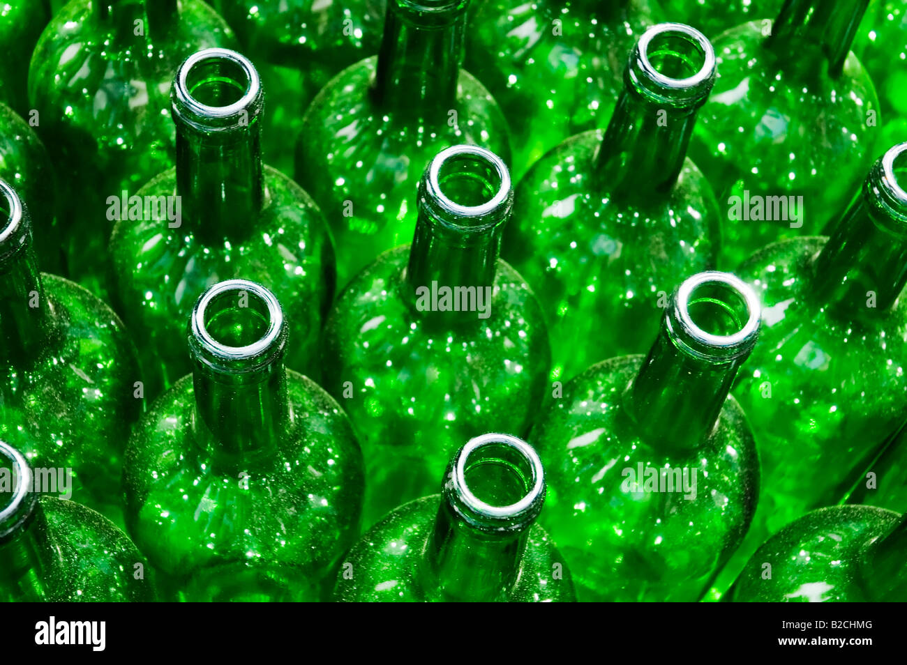Stack of empty green glass bottles in a winery Stock Photo - Alamy
