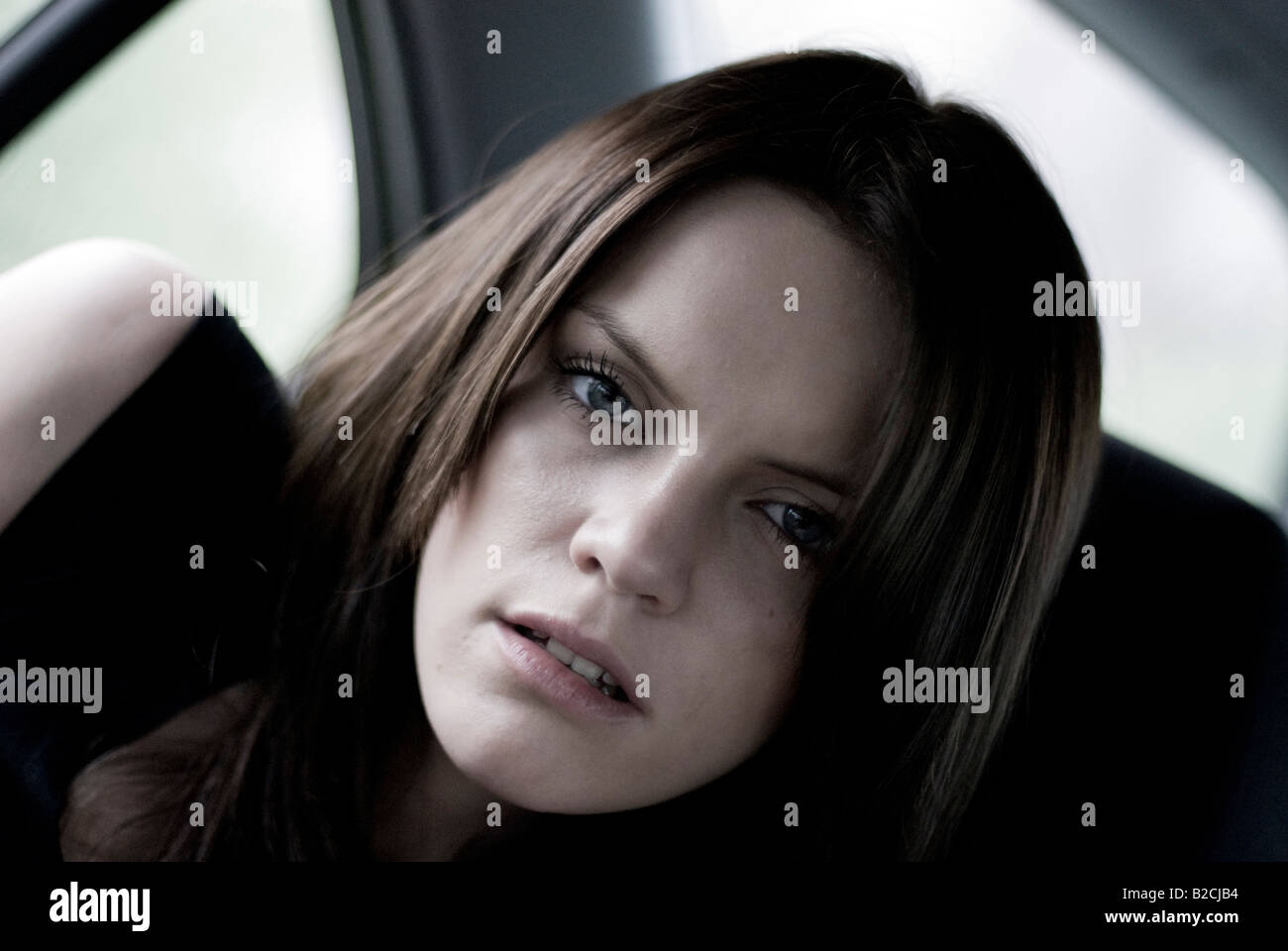 portrait of a young woman in a car Stock Photo - Alamy