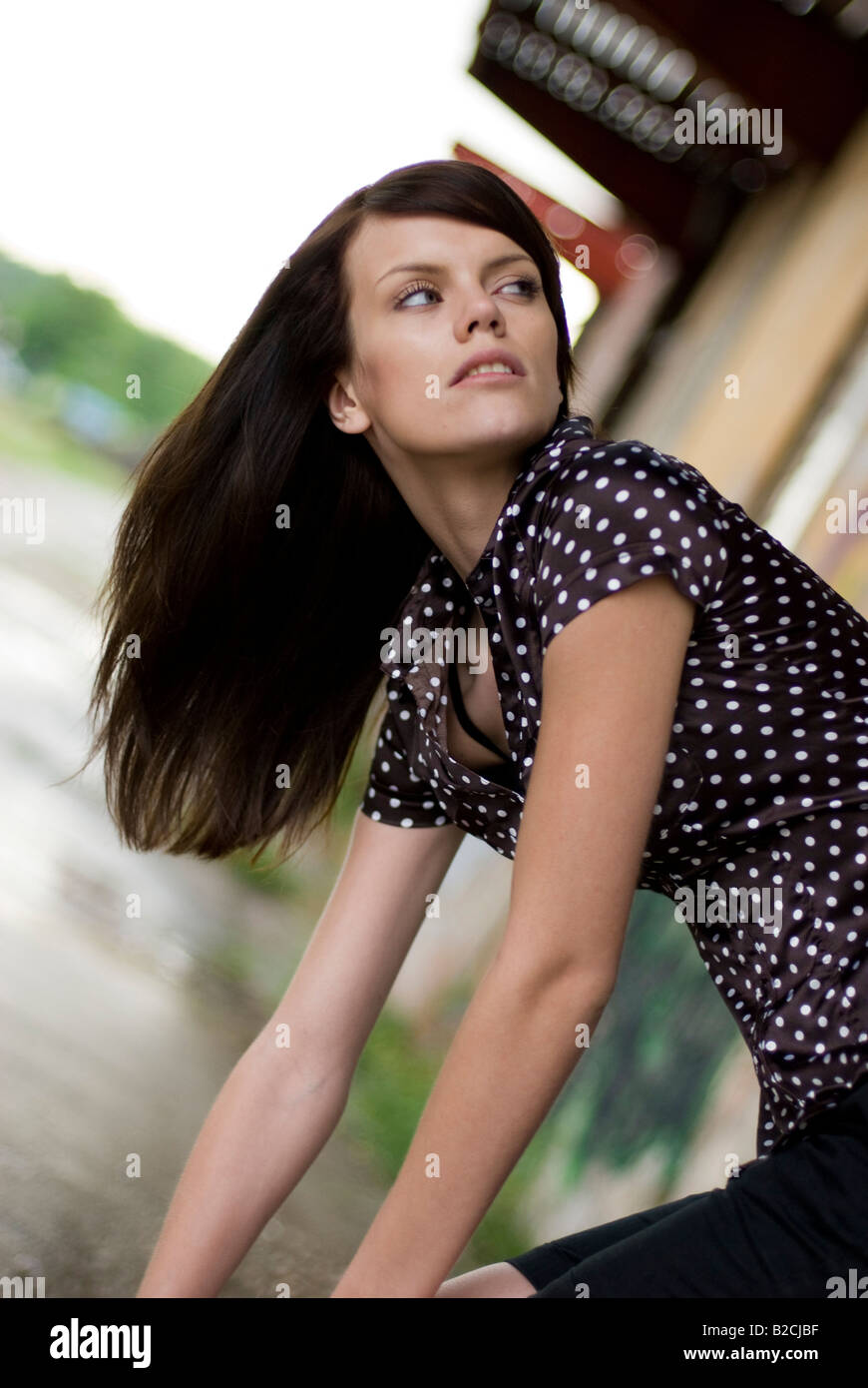 Bending down bent down hi-res stock photography and images - Alamy