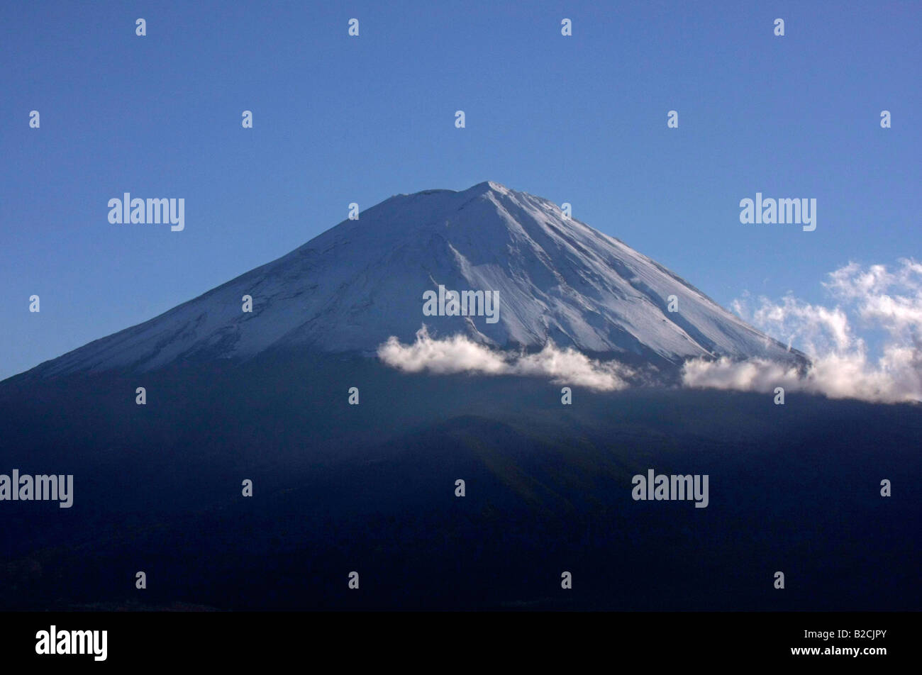 Snowy top of Mt. Fuji with clouds Yamanashi Japan Stock Photo - Alamy