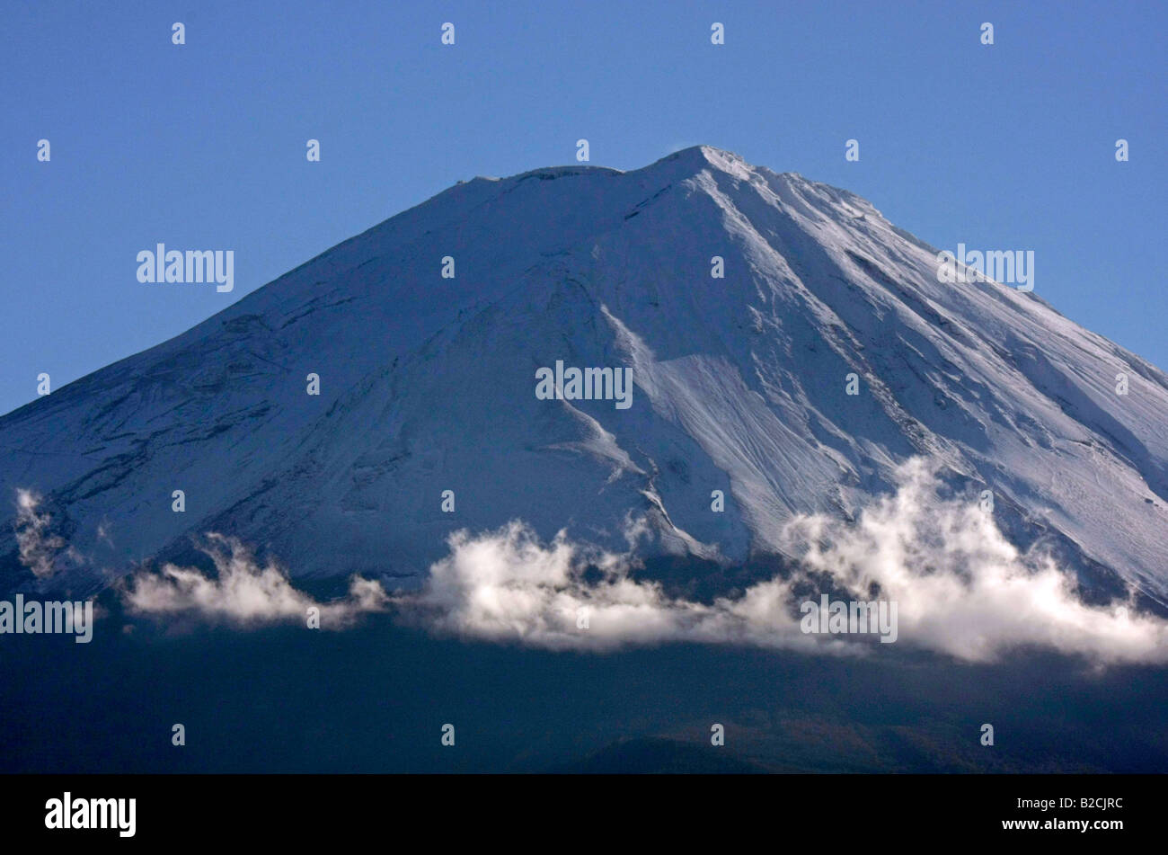 Snowy top of Mt. Fuji with clouds Yamanashi Japan Stock Photo - Alamy