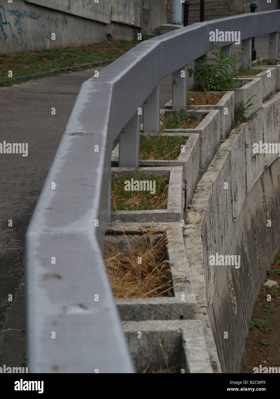 concrete wall with plant vats Stock Photo - Alamy