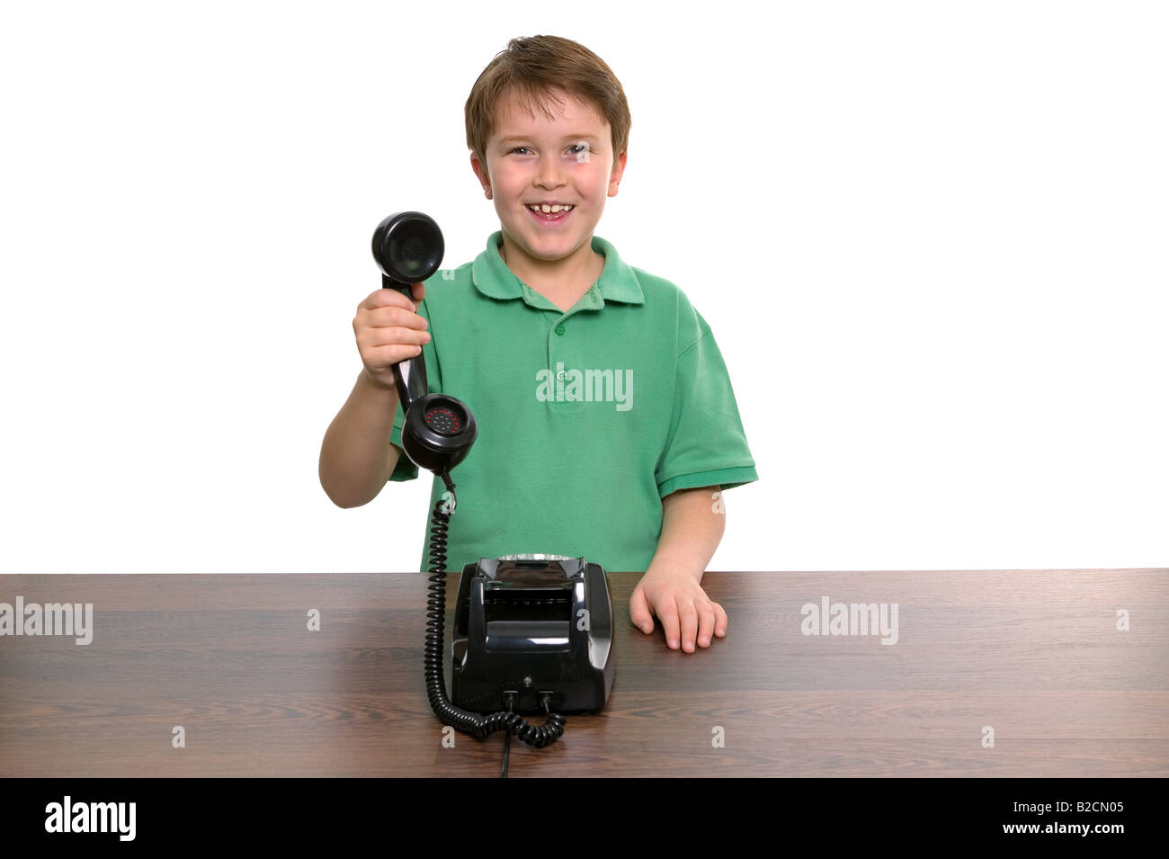 Child picking up an old telephone hi-res stock photography and images ...