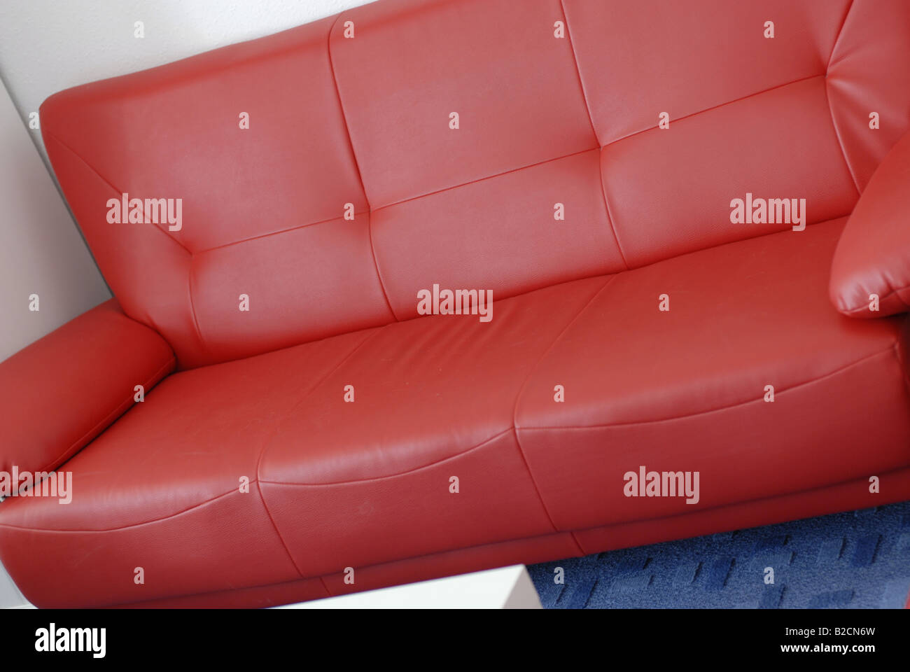 red leather couch Stock Photo - Alamy