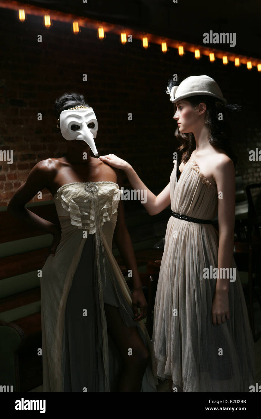 Young stylish women wearing costumes Stock Photo - Alamy