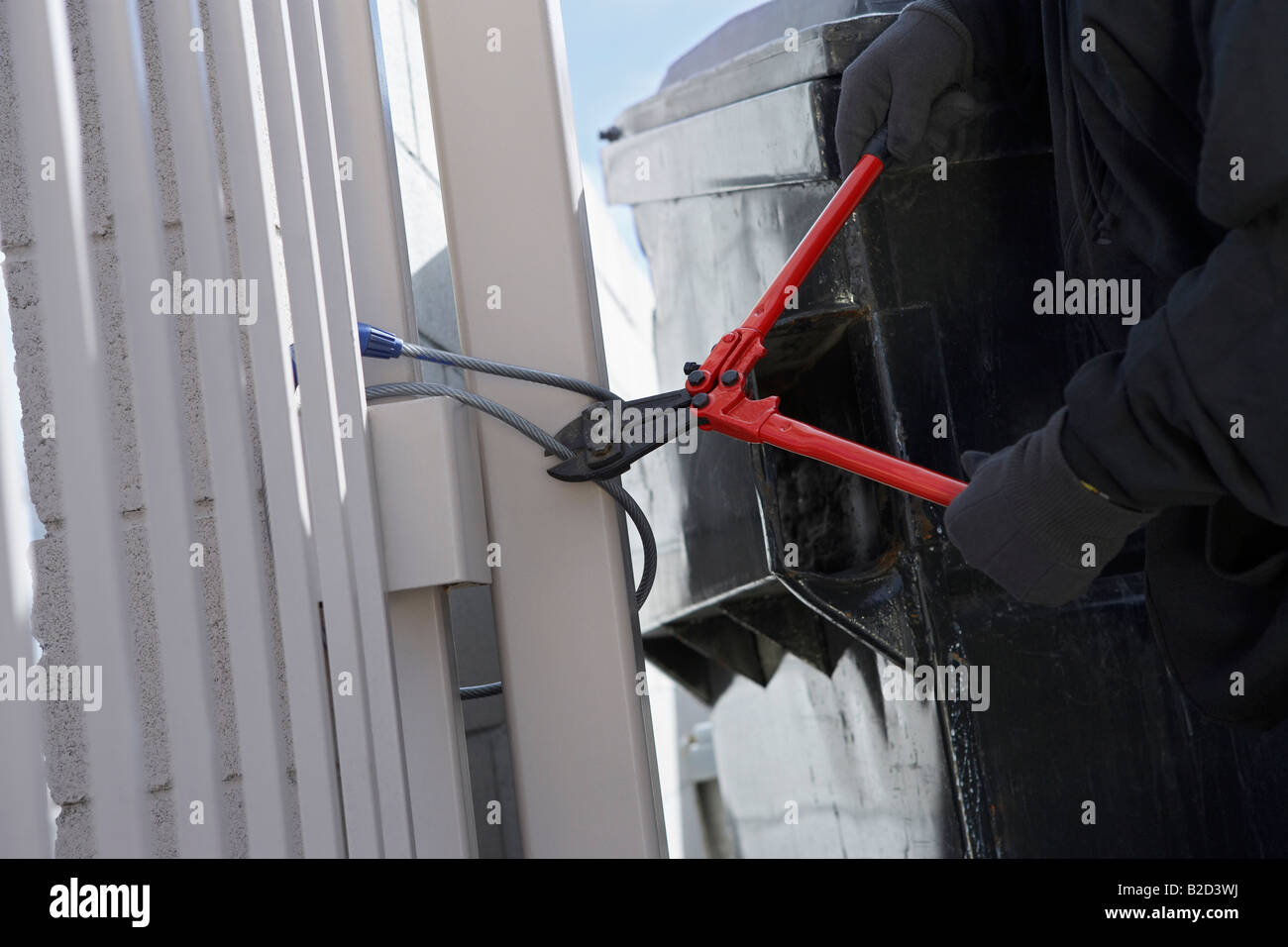 Thief cutting lock Stock Photo - Alamy