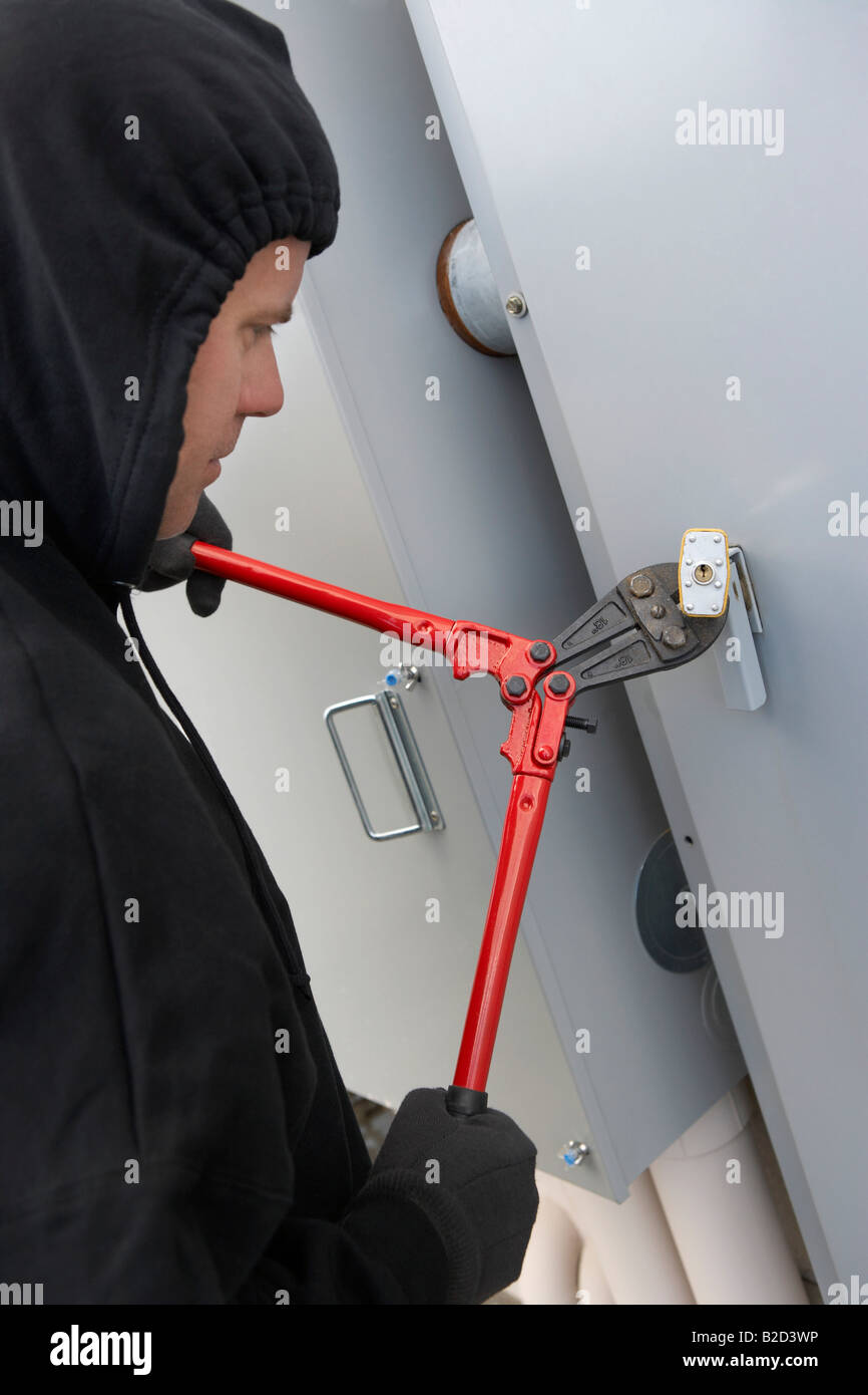 Thief cutting lock Stock Photo - Alamy