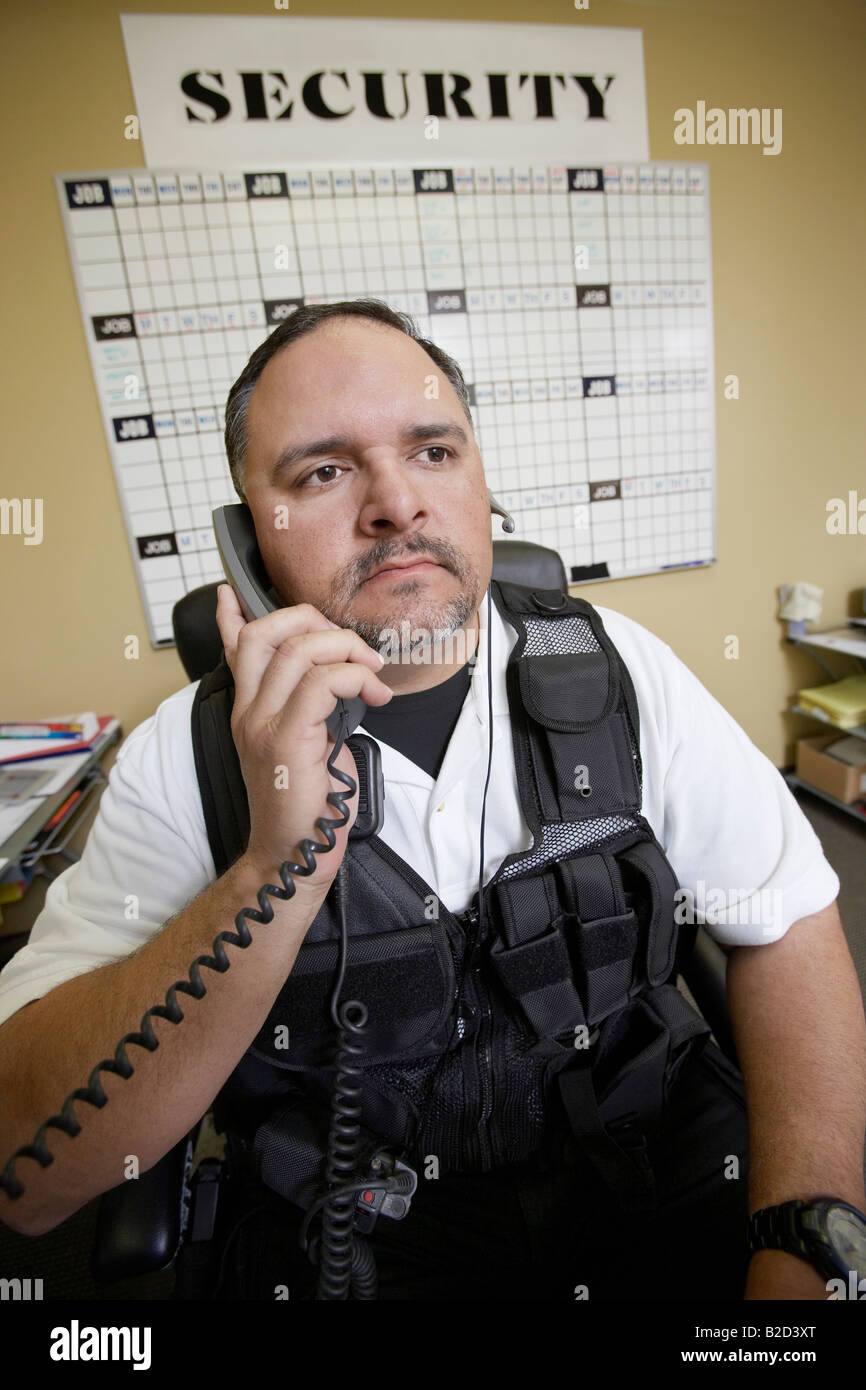 Security guard at work Stock Photo - Alamy