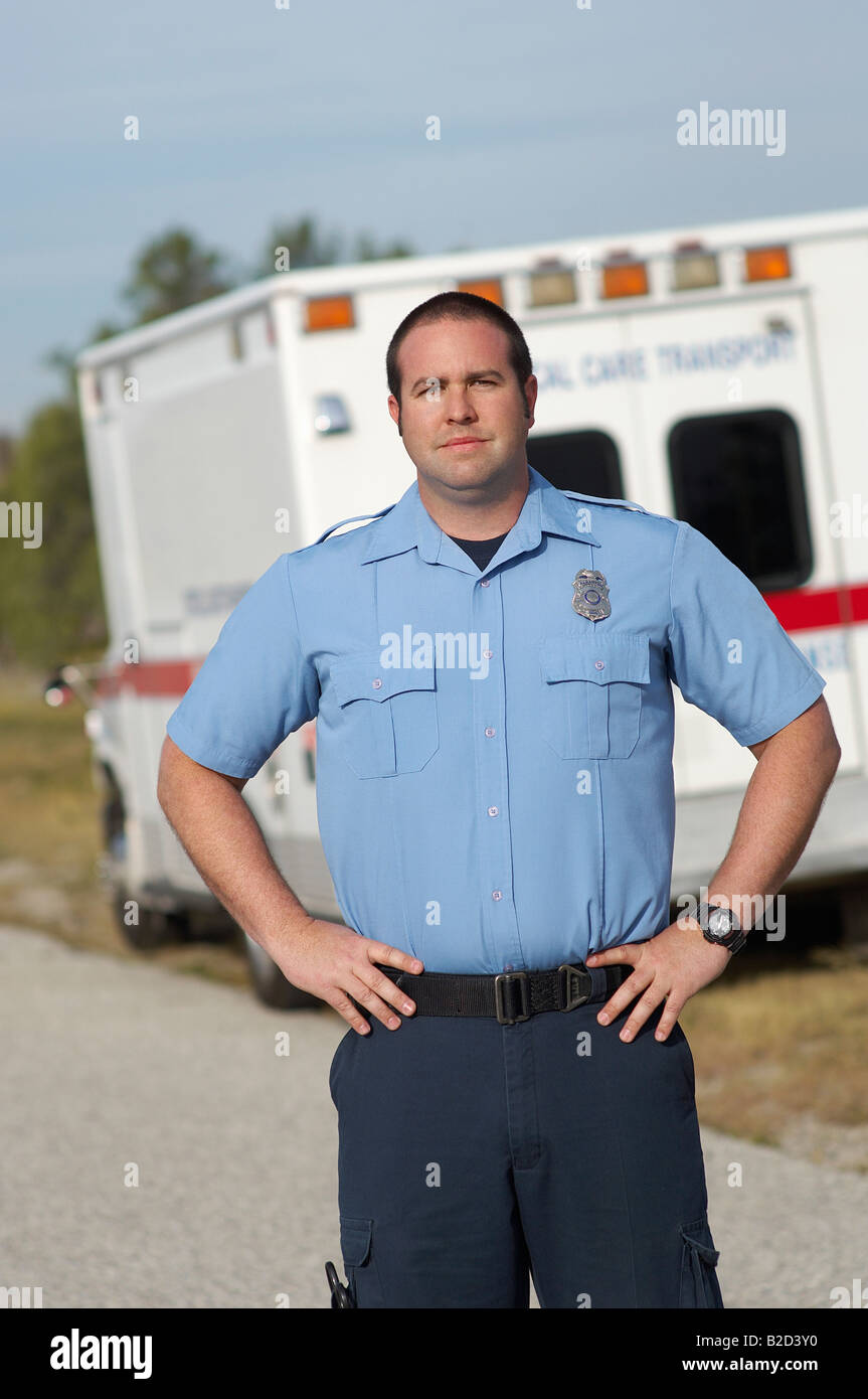 Portrait of paramedic in front of ambulance Stock Photo - Alamy