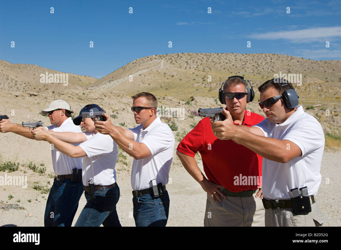 Group People Aiming Guns In High Resolution Stock Photography and ...
