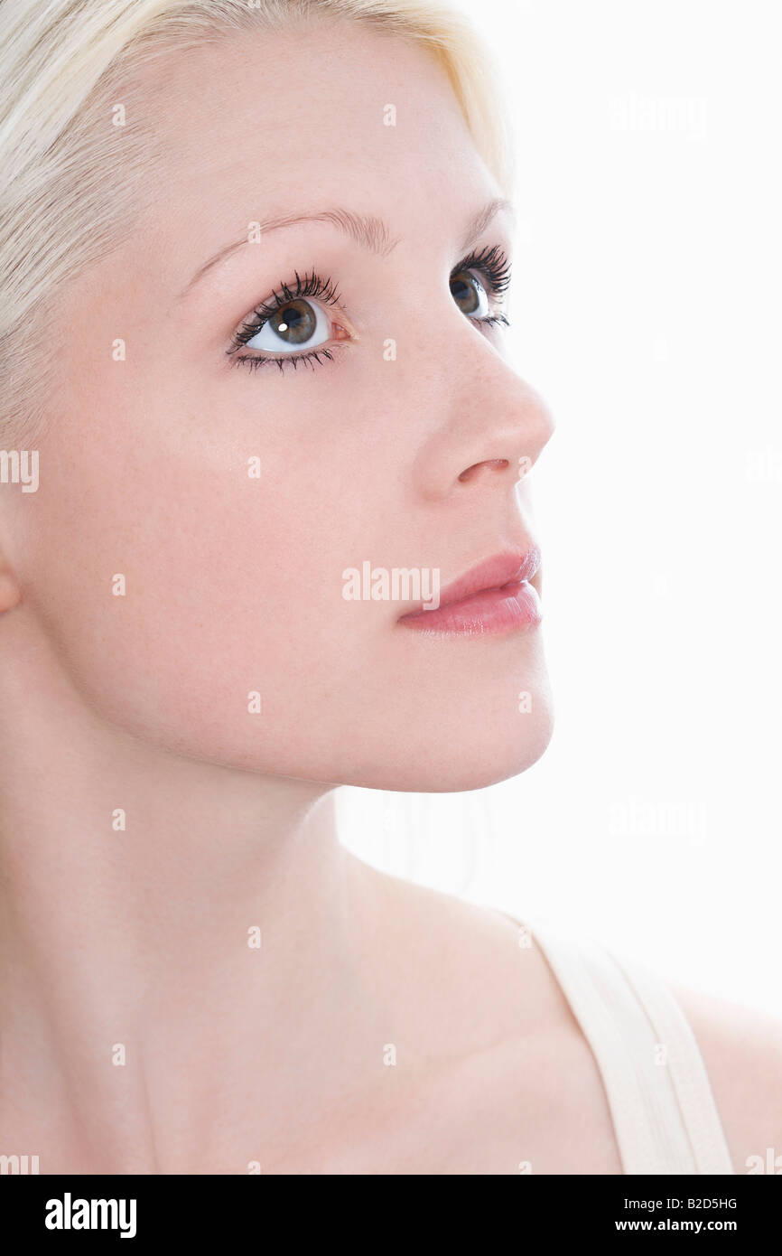 Studio shot of young woman, close-up Stock Photo - Alamy