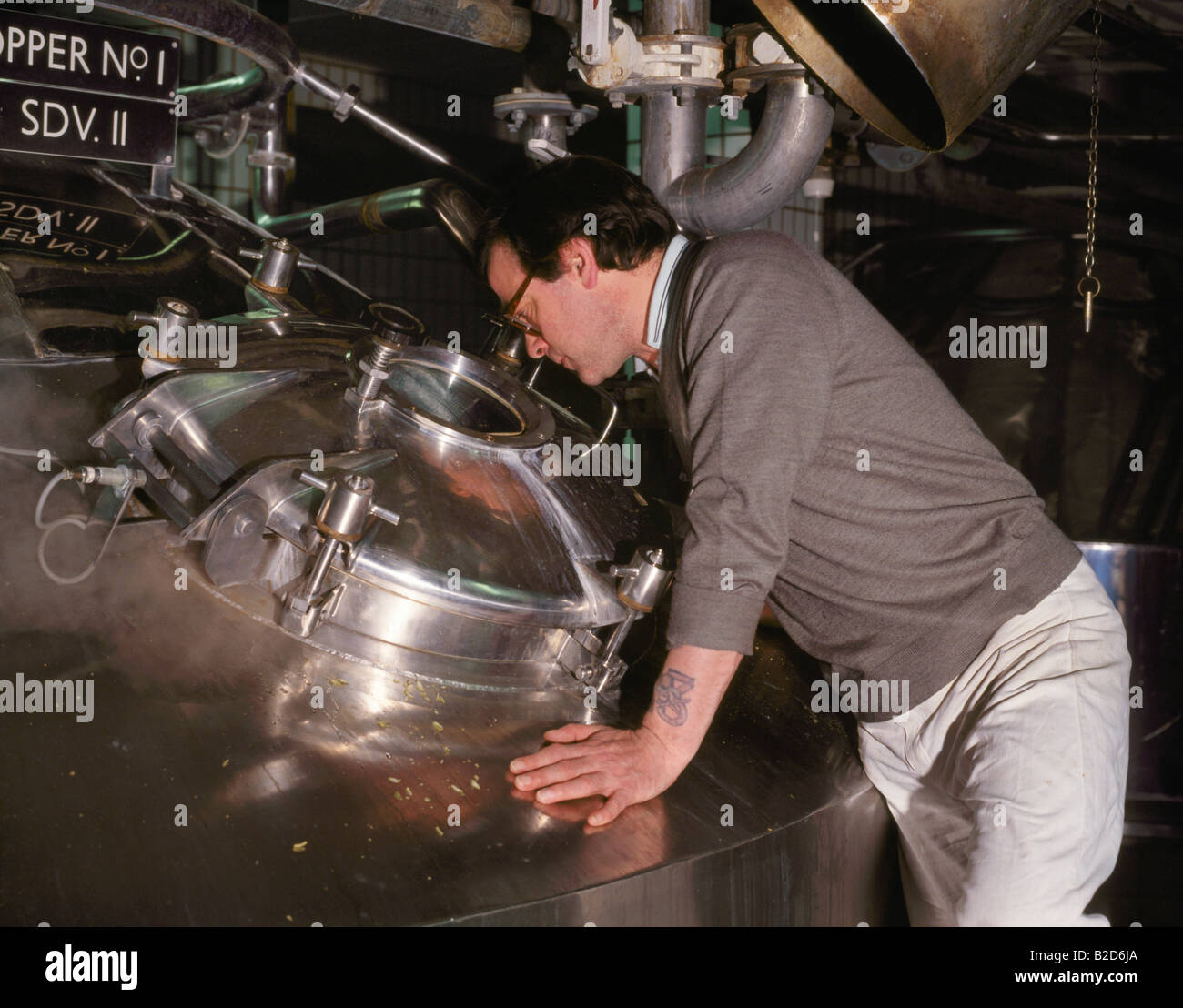 Viewing inside of brewing copper through inspection hatch Youngs Ram ...