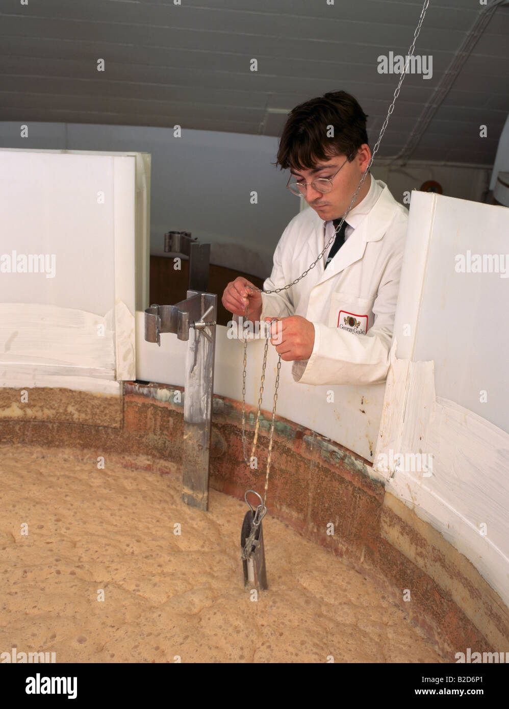 Checking the temperature of a brew at the brewery of George Gale Co ...