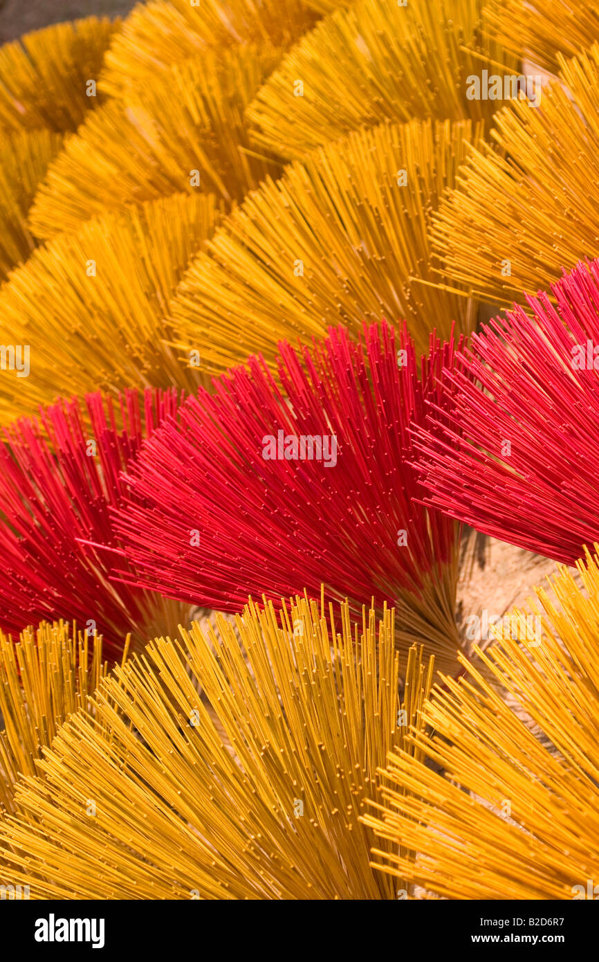 Coloured incense sticks dry in the sunshine in Vietnam Stock Photo - Alamy