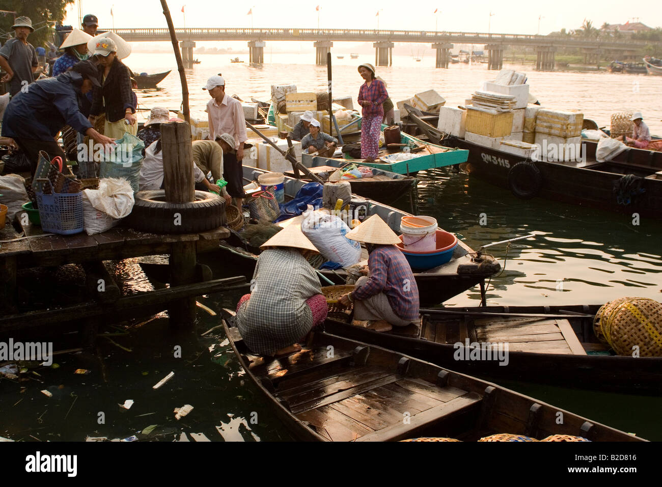 Fish is landed by boat at the fish quay at Hoi An, Vietnam Stock Photo ...