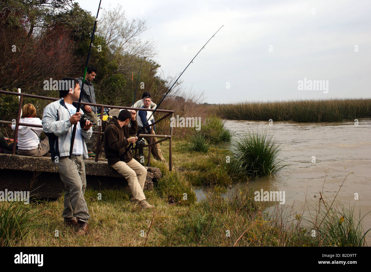 Group of men fishing hi-res stock photography and images - Alamy
