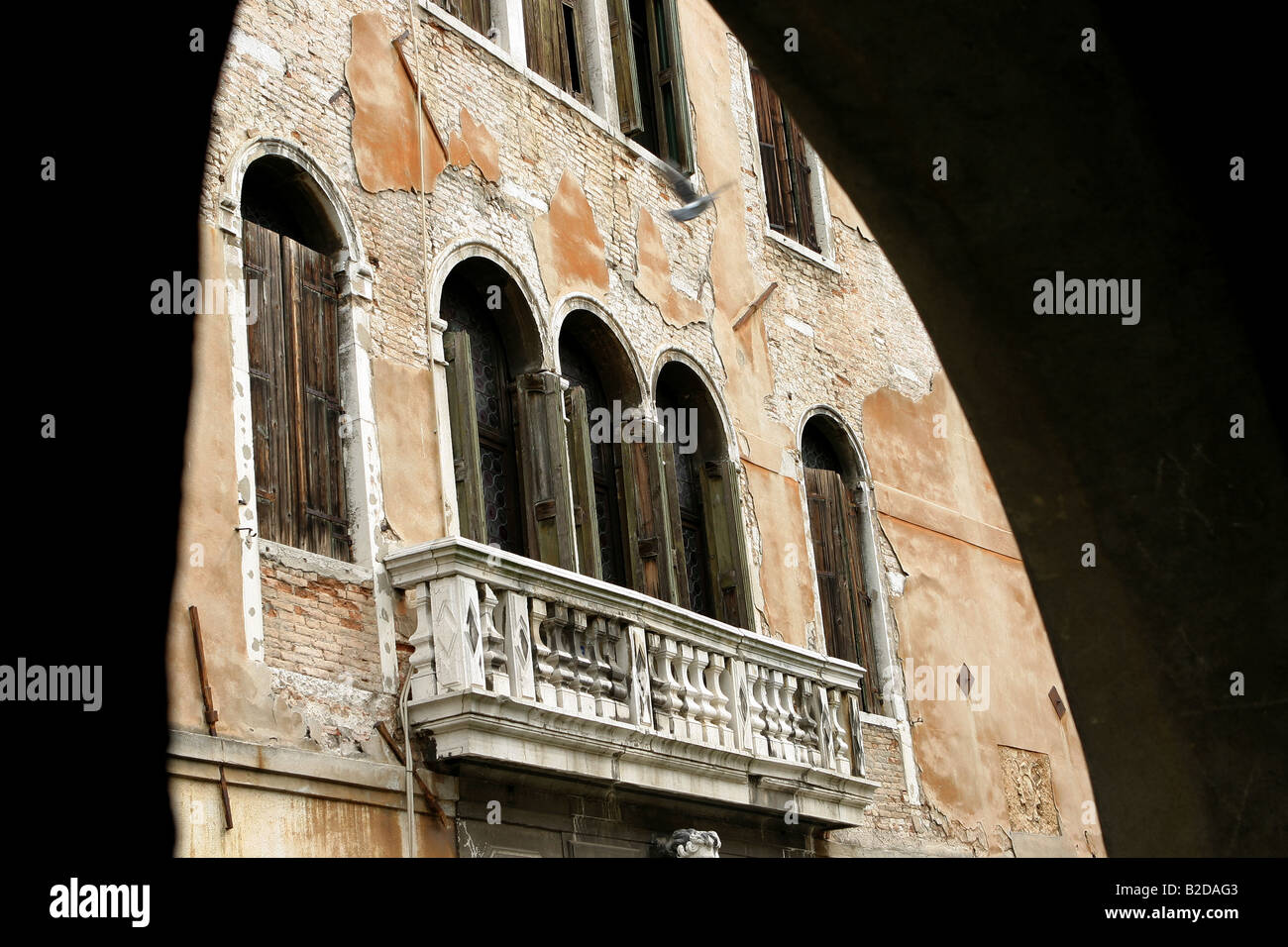 Windows and balcony of a palazzio palace in Venice Italy Stock Photo ...