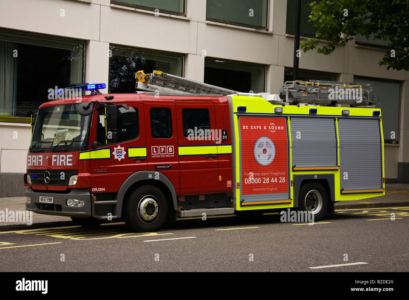 London Fire Brigade Fire Engine attending an emergency incident at ...