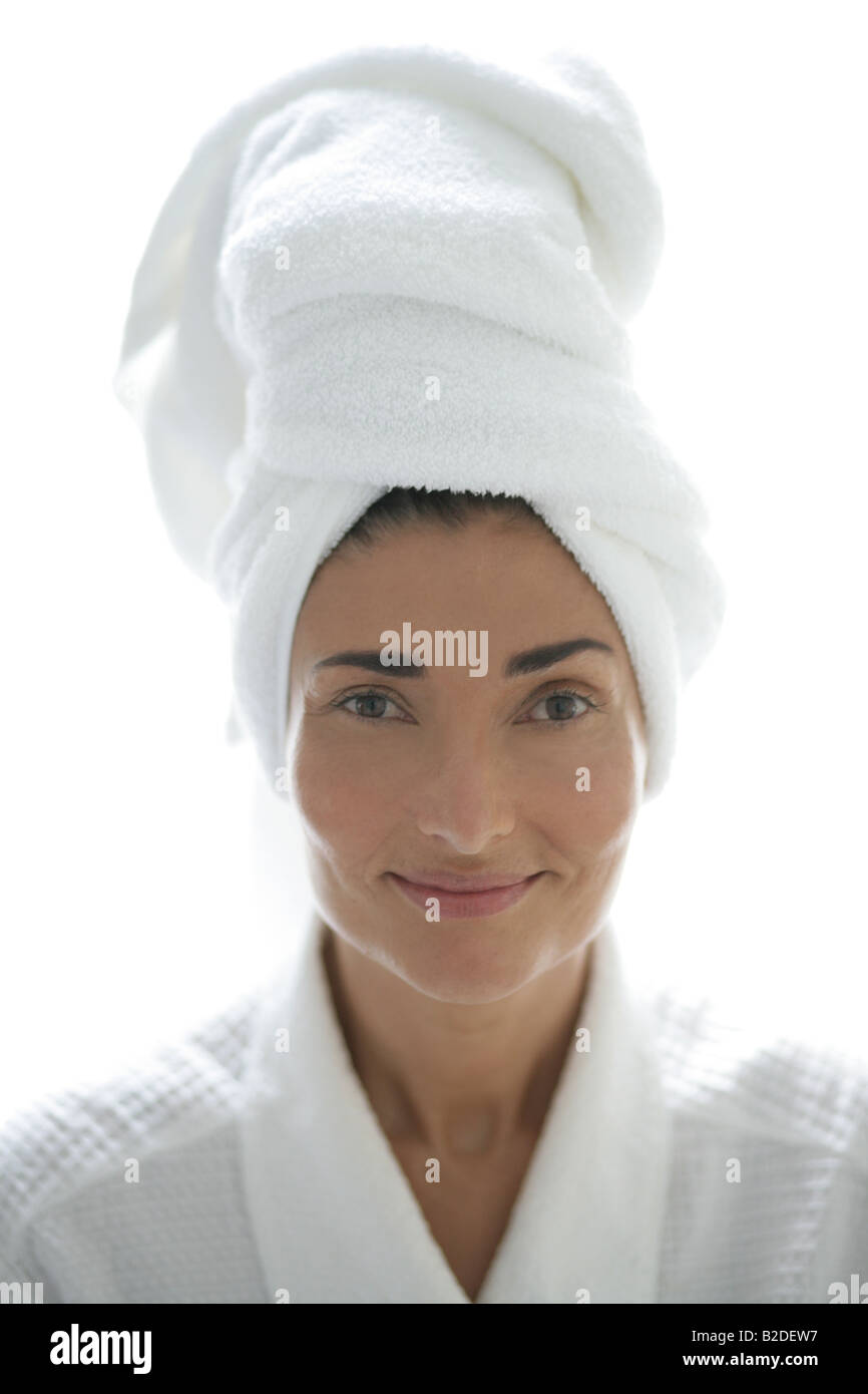Woman with towel on head Stock Photo - Alamy
