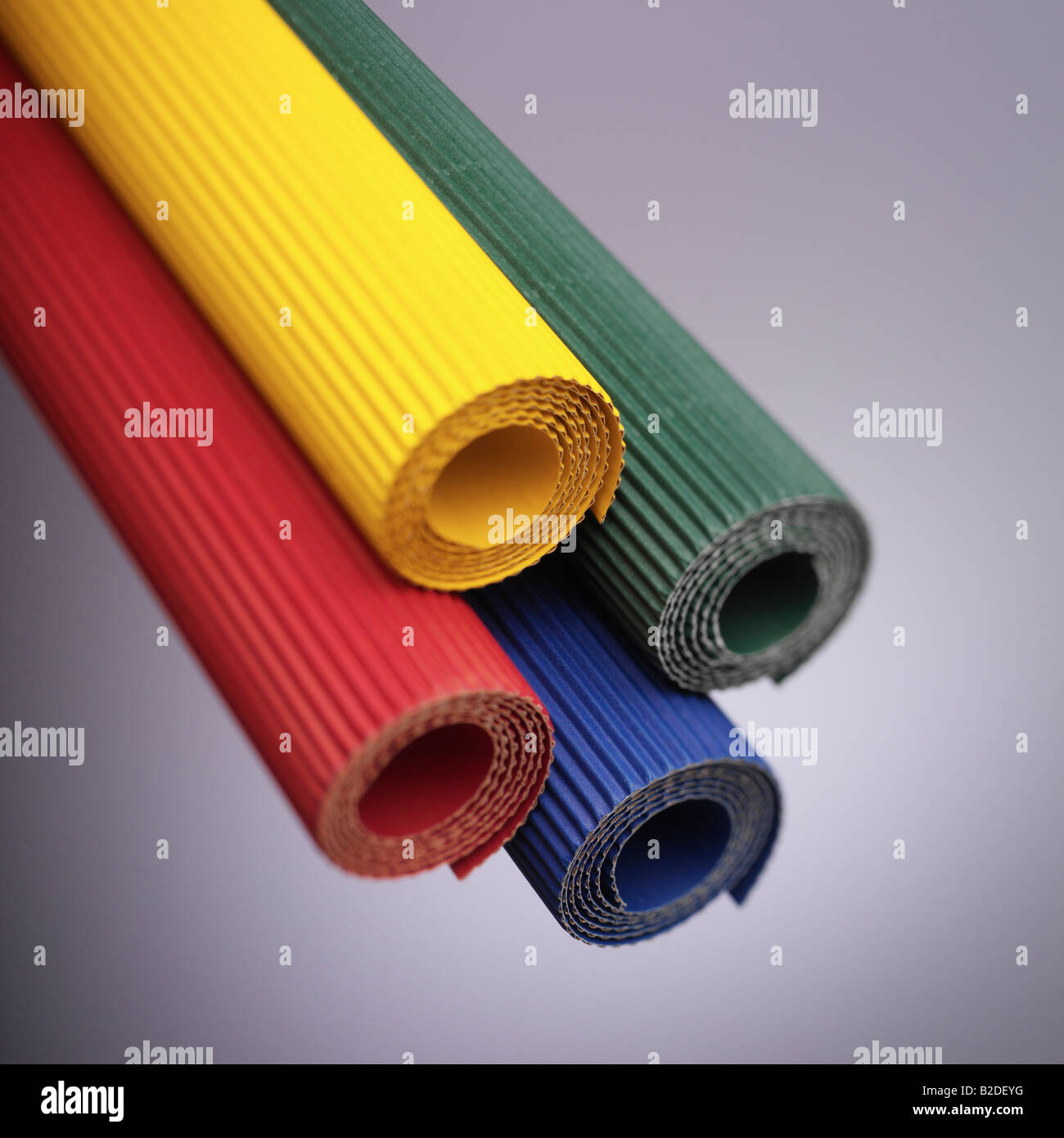 Coloured rolls of corrugated paper Stock Photo - Alamy