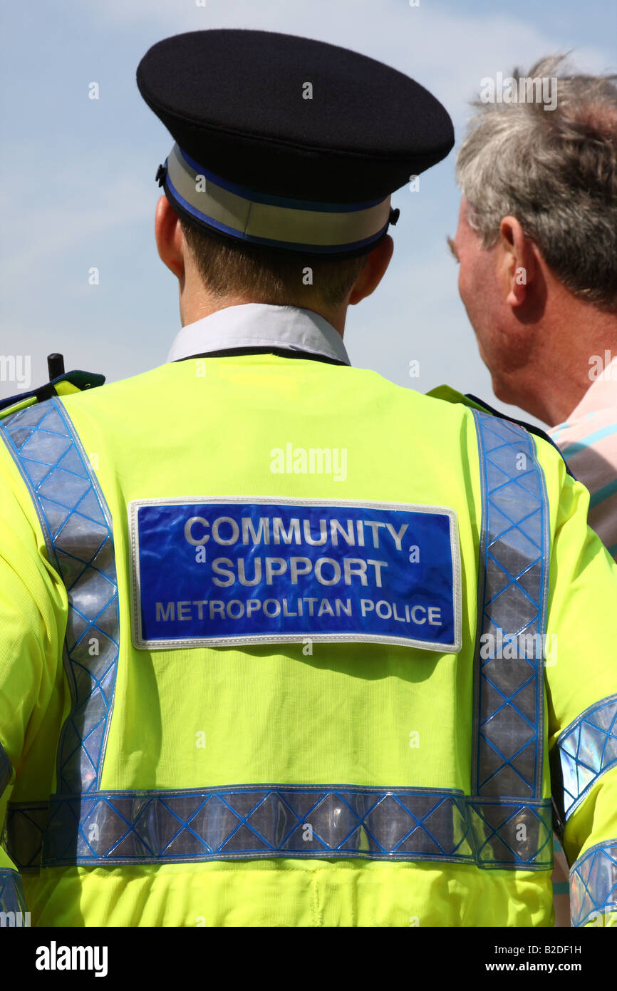 Metropolitan Police Community Support Officer speaking with a member of ...