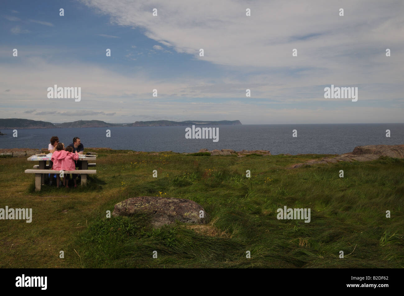 A family picnics at Cape Spear, Newfoundland, the easternmost point in ...