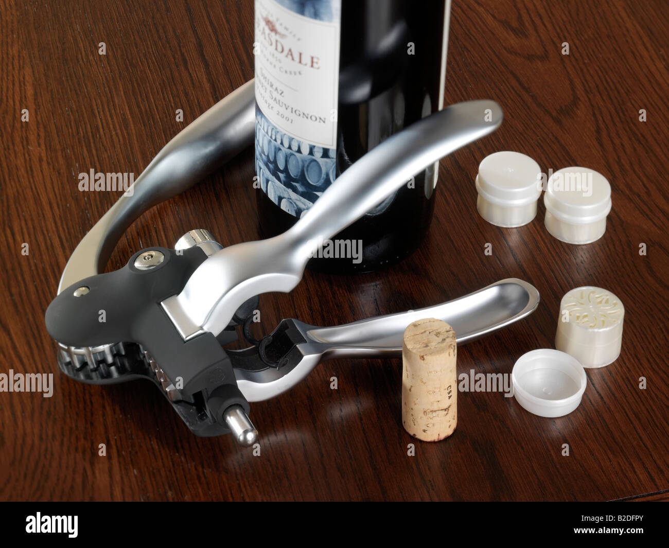 Wine bottle opening kit & stoppers Stock Photo - Alamy