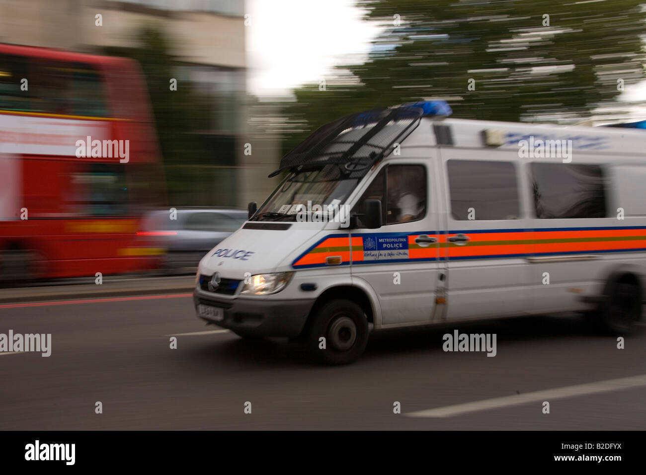 Speeding police van driving through London on its way to an emergency ...