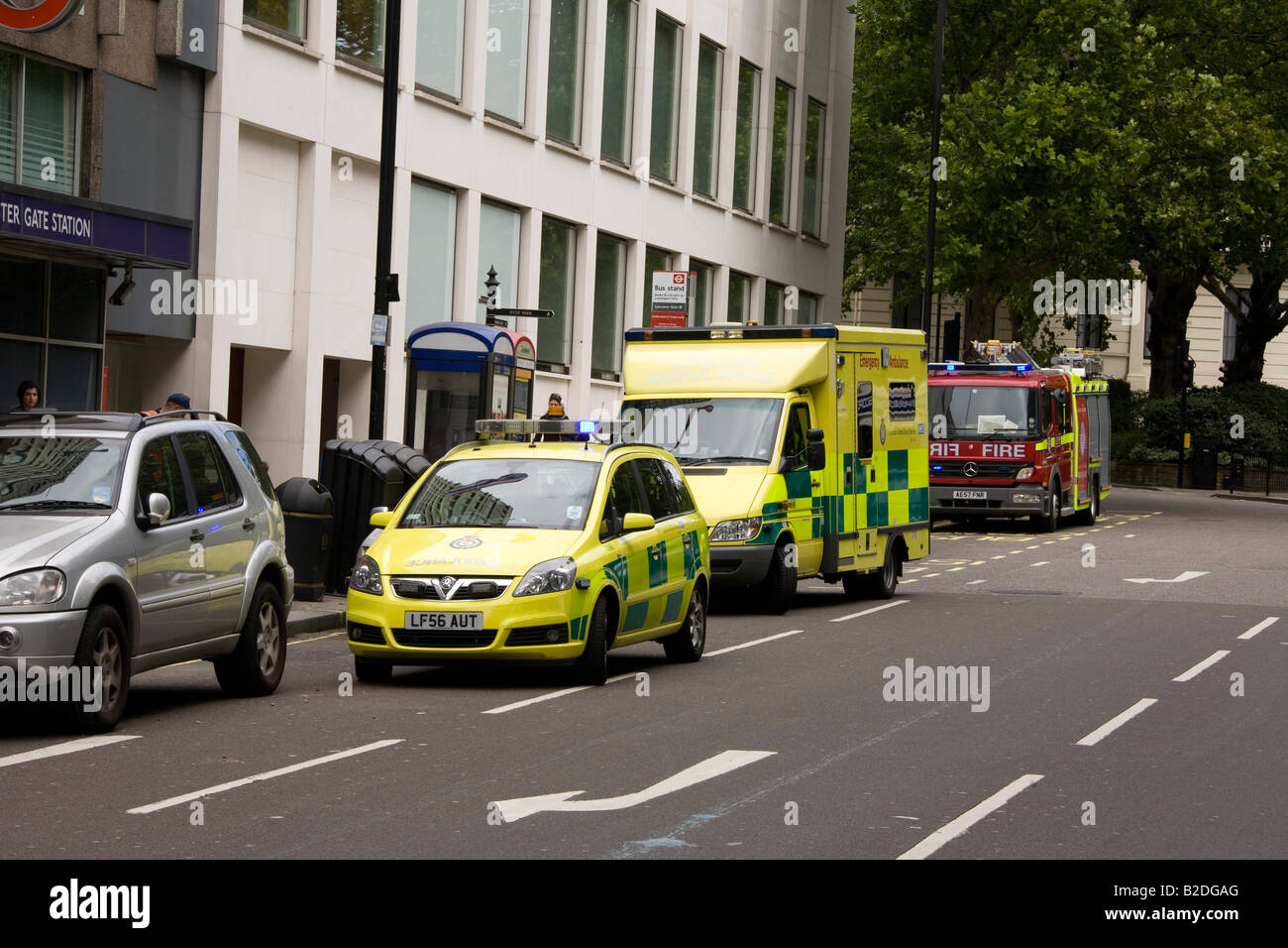 London Ambulance service and London fire brigade attending a scene at ...